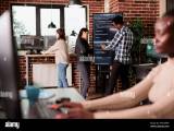 Tech Enginners Using Binary Code To Script Security System Programming