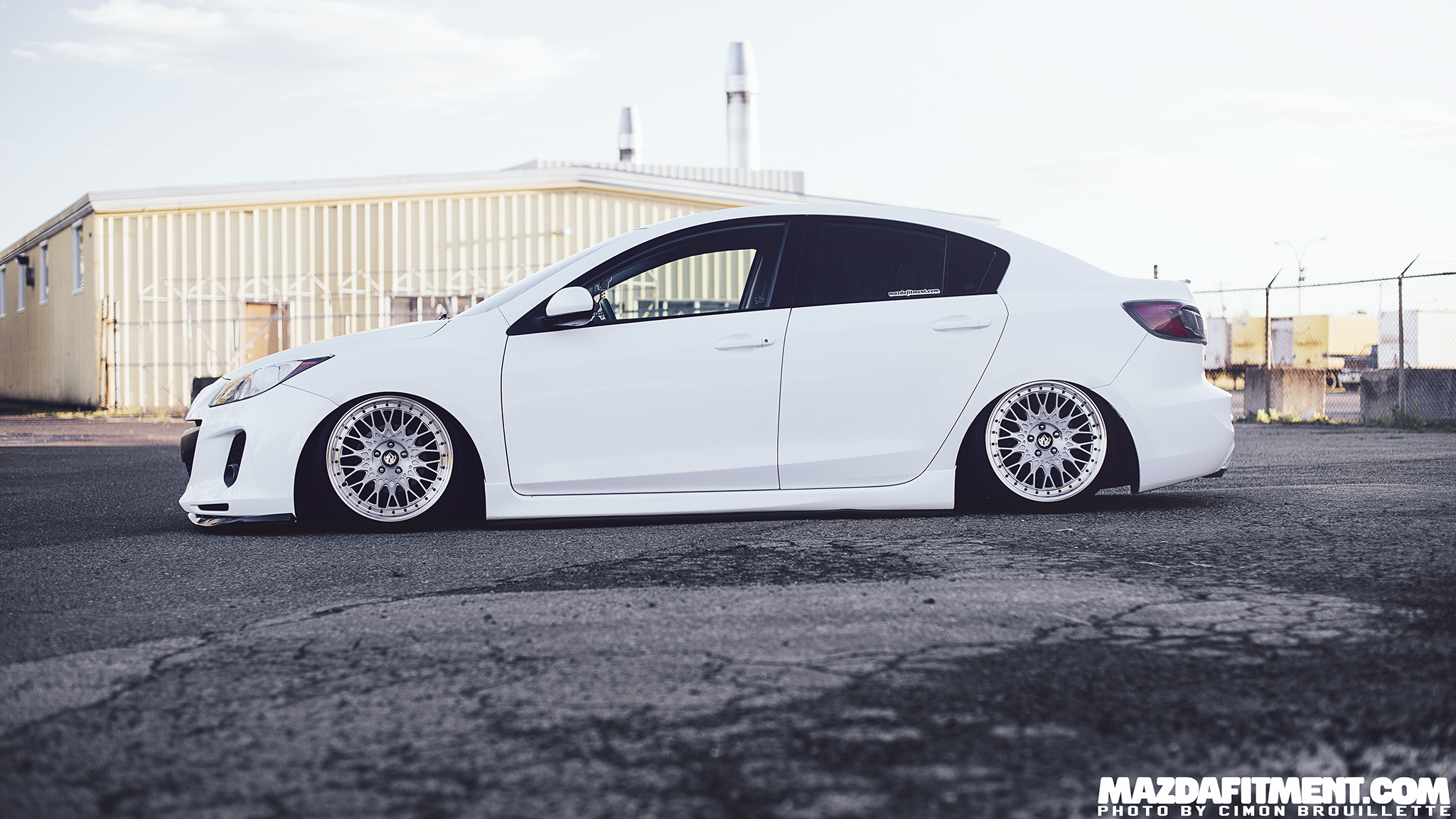 White Eyed Sedan – Mazda Fitment