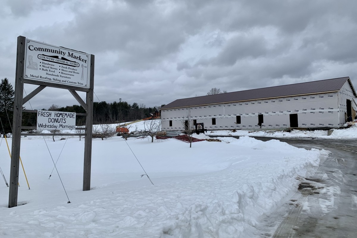 Amish quickly rebuilding on the site of the burned-out store in Unity
