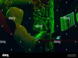 Hacker Using Computer Malware Software And Hacking Binary Code Green