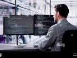 Web Developer Coding On Computer To Develop Code Stock Photo Alamy