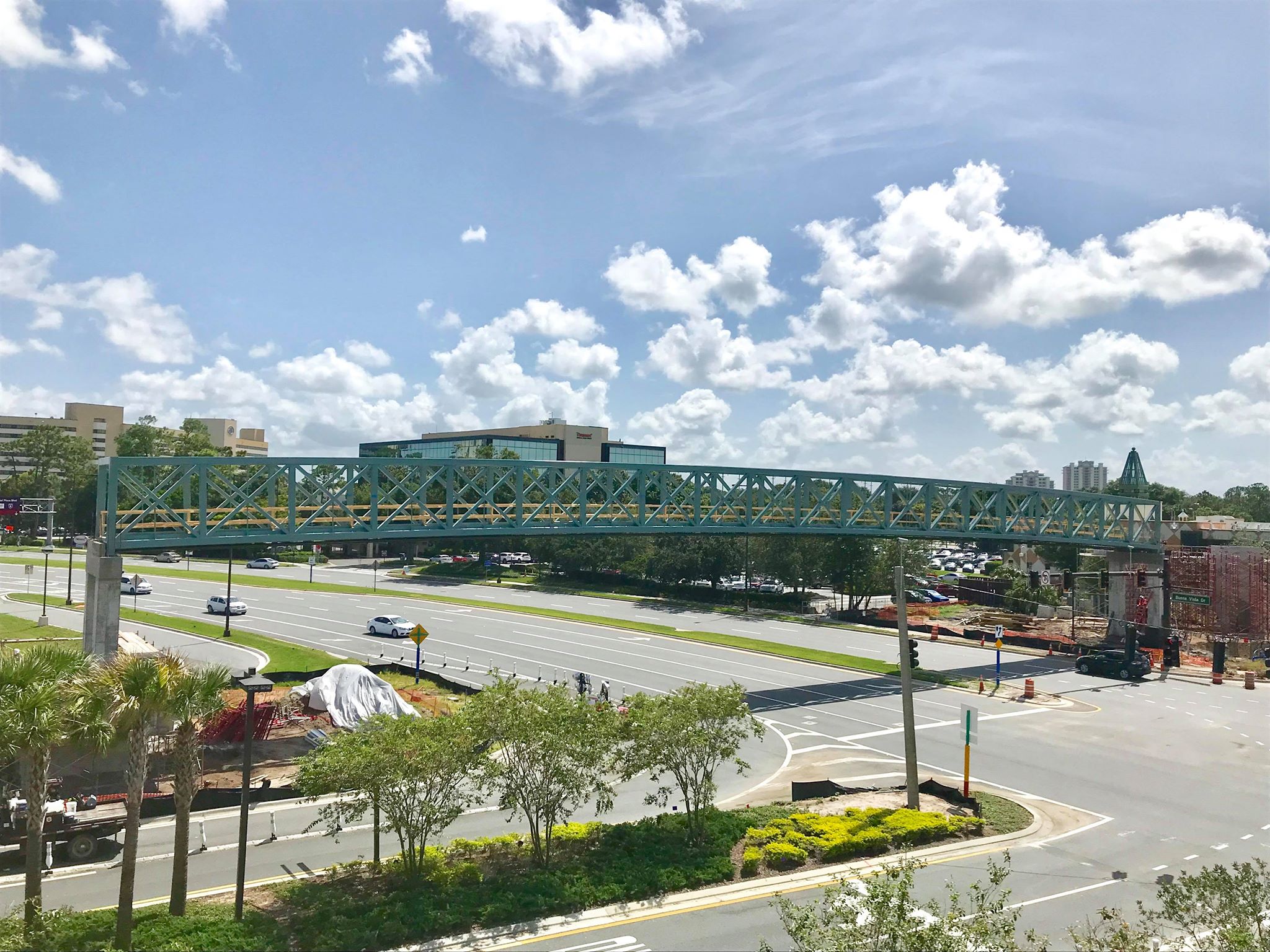 Pedestrian Bridge Installed Connecting New Parking Garage and Disney ...