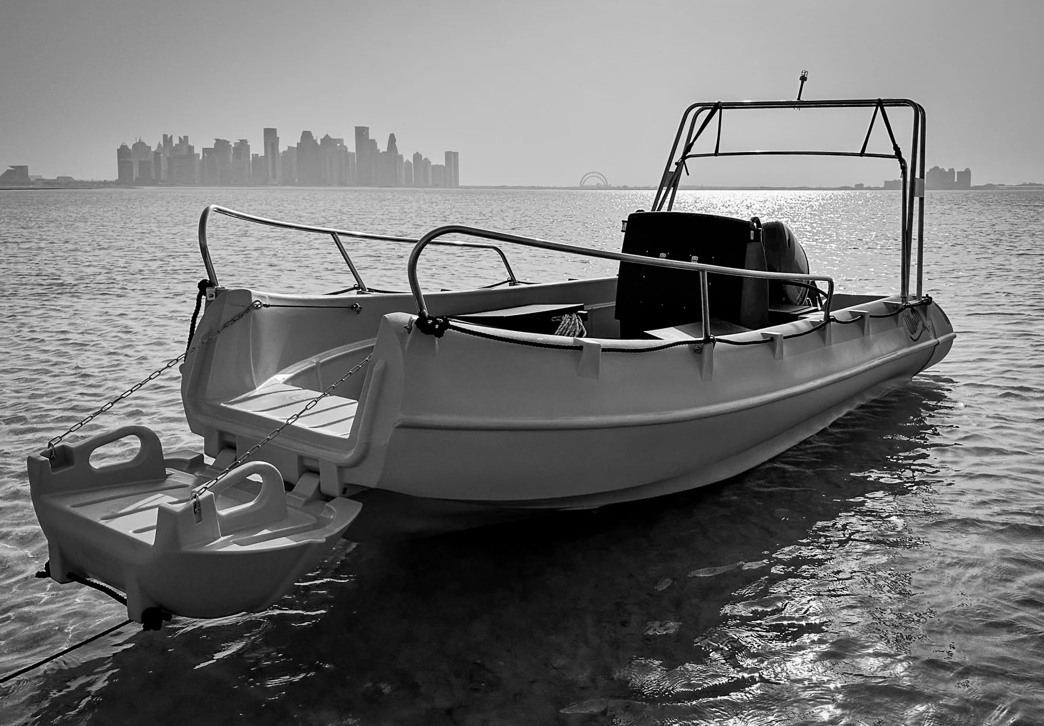 Kite Wing Shuttle To Our Spot On An Island In Front Of Dohas Skyline