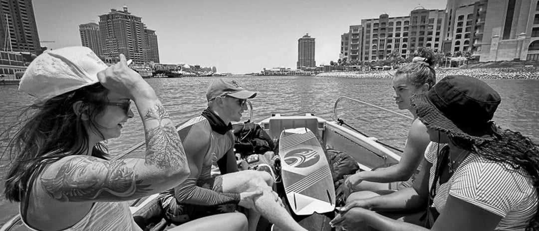 Kite Wing Shuttle To Our Spot On An Island In Front Of Dohas Skyline