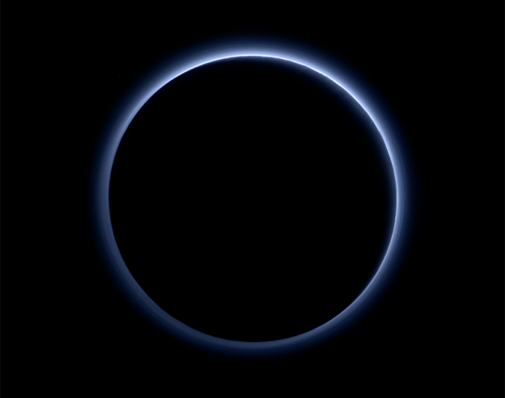 Pluto pics reveal blue glow – and water ice – Cosmic Log