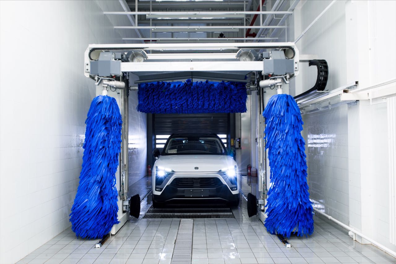 NIO opens its first electric car service center right next to Tesla's ...