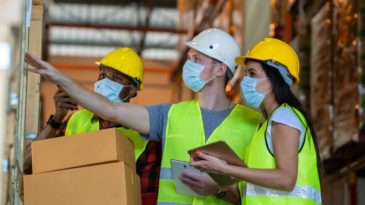 masked-warehouse-workers-pulling-inventory - ERP Cloud Blog