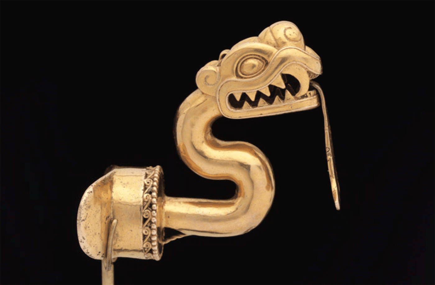 A Serpentine Example of Aztec Body Modification Slithers into The Met ...
