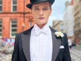 Character Identification Who Is The Top Hatted Person In The New