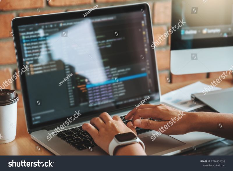 Developing Programmer Team Reading Computer Codes Stock Photo Edit Now - Geometric Illustration Collection - High Resolution Quality