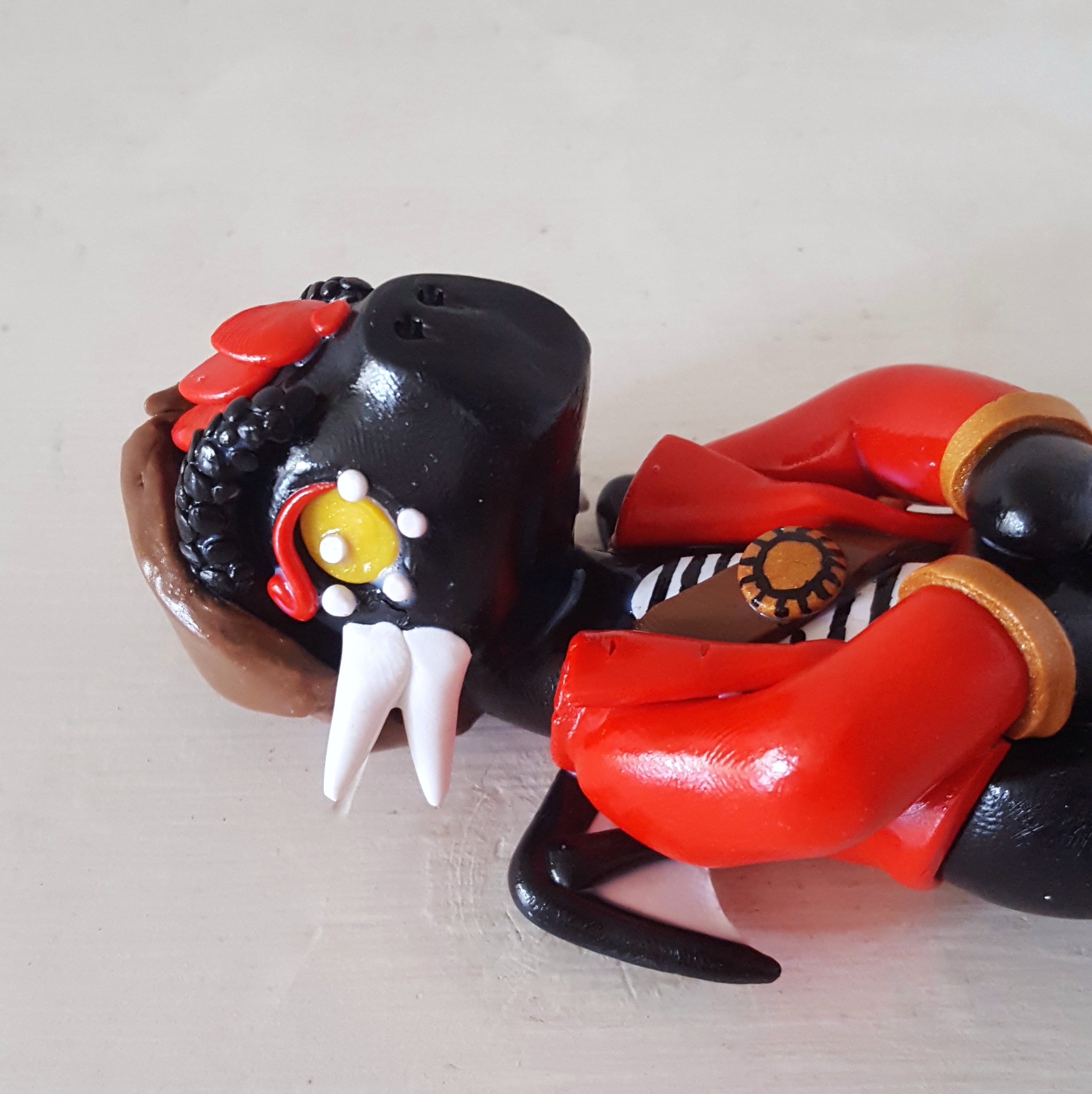 The line work on his belly is hand painted; they’re probably the ...