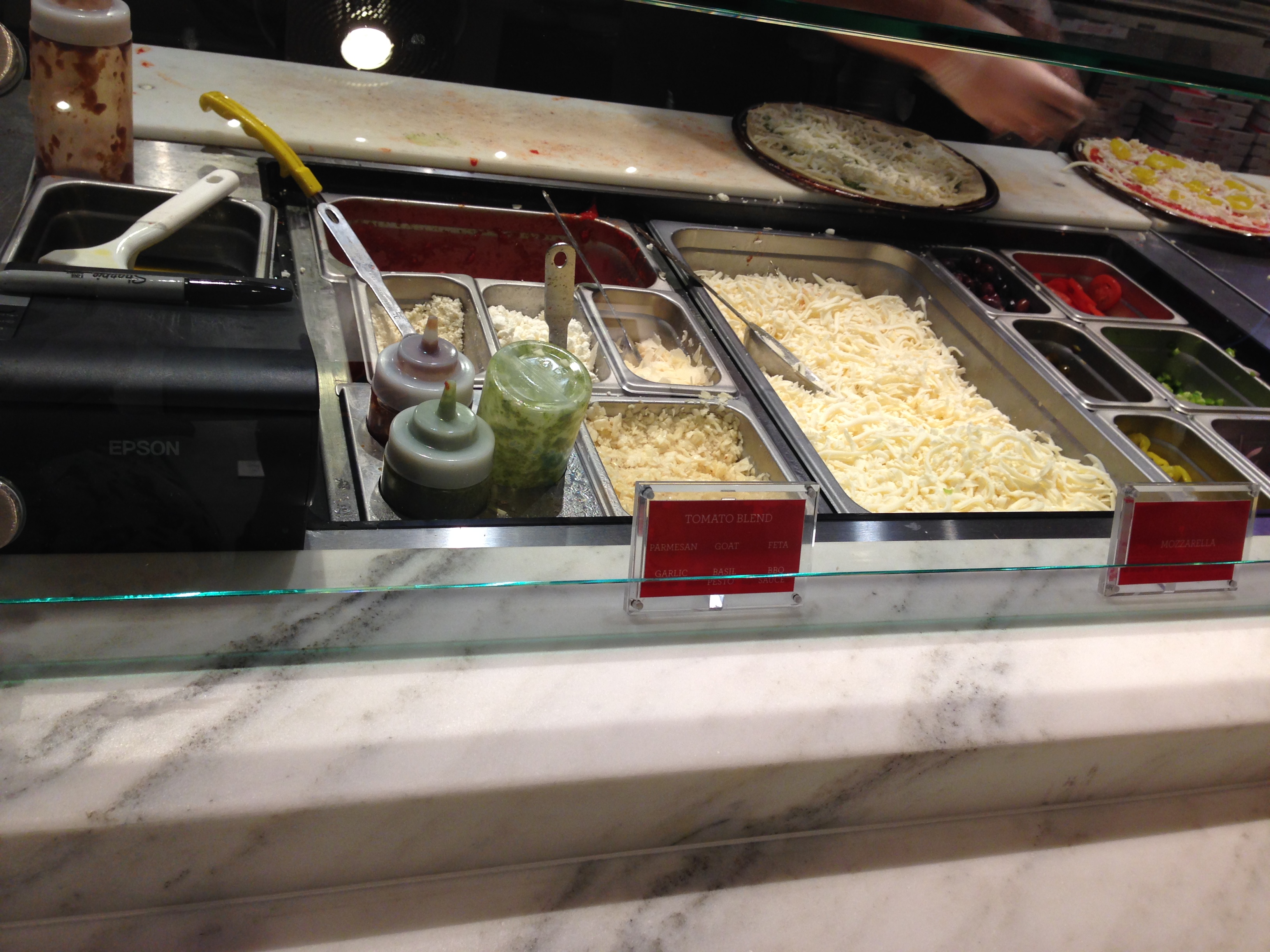 Enjoying a Custom Made Pizza at The Pizza Studio - LA Explorer