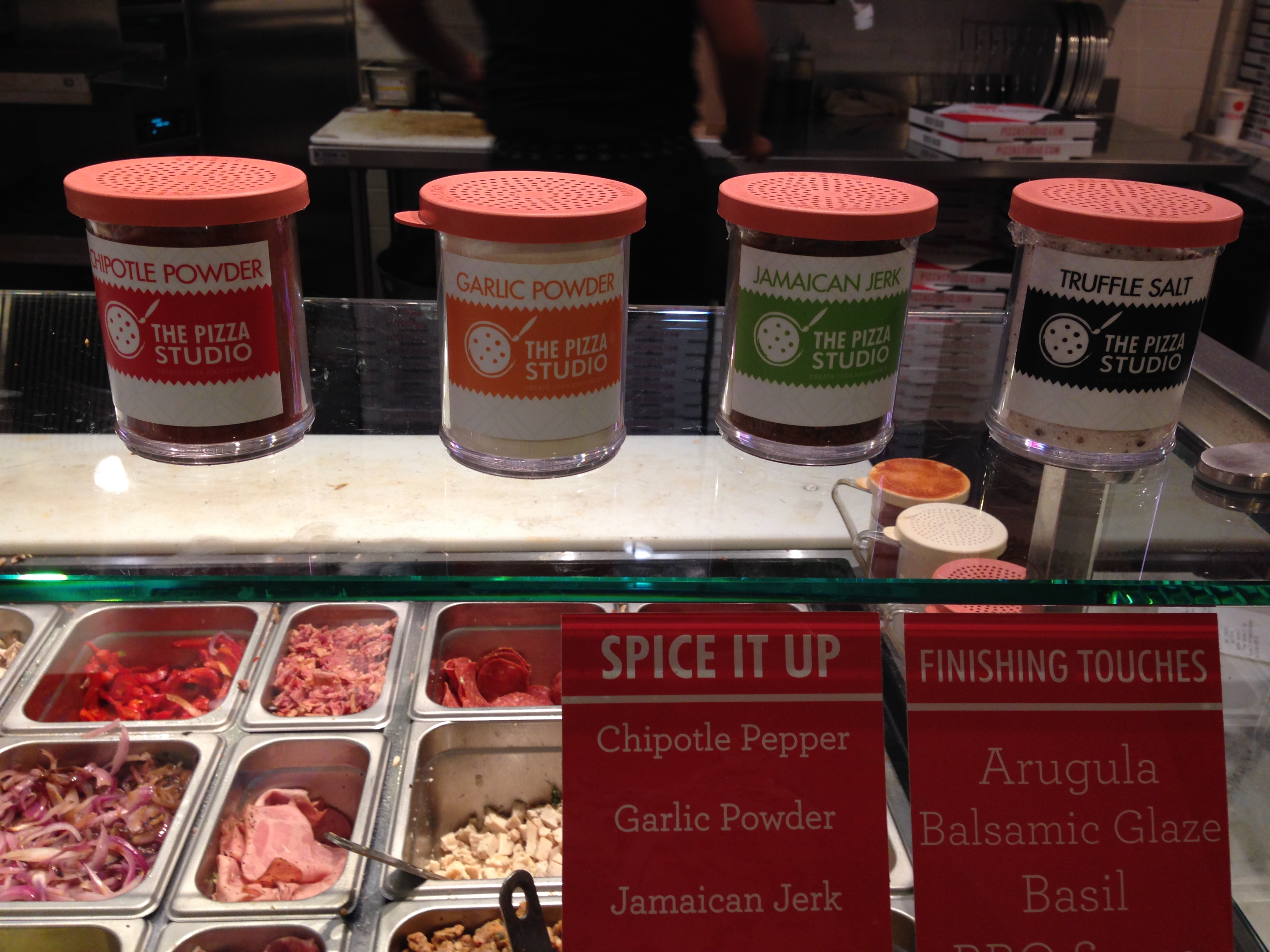 Enjoying a Custom Made Pizza at The Pizza Studio - LA Explorer