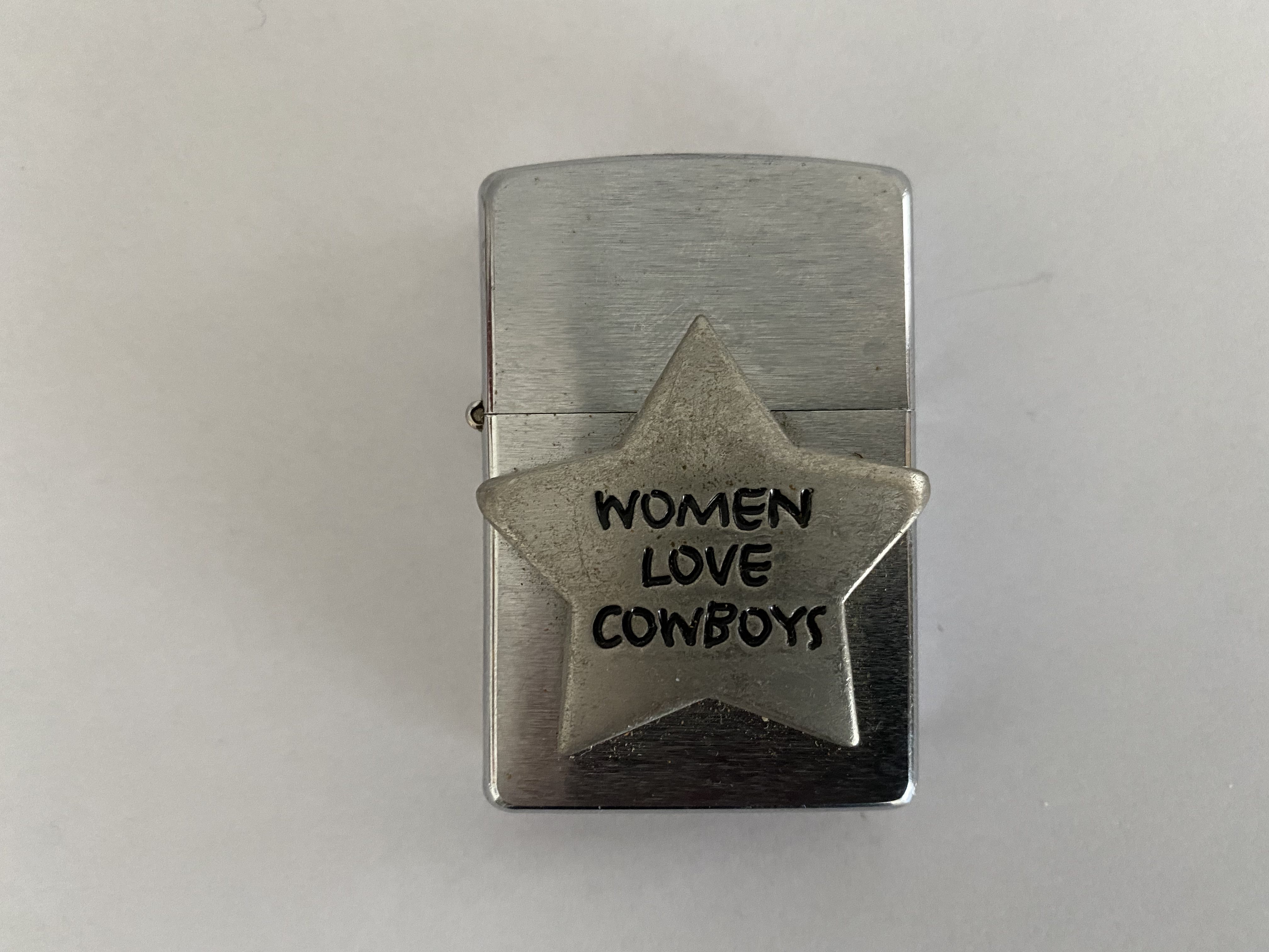 Briquet, Zippo "women love cowboys" | lalmachine.com