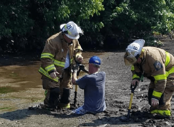 Firefighters Rescue Man Stuck In Mud