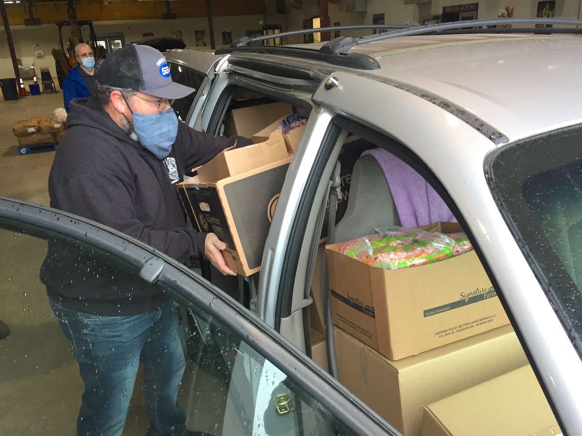 Workers Helping Workers: organized labor distributes food boxes to ...