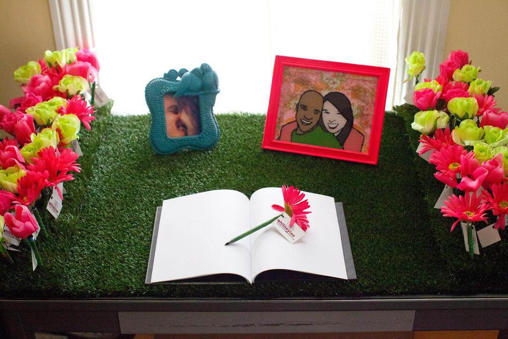 Kitschy DIY guestbook table with flower pen favors • Offbeat Wed (was ...