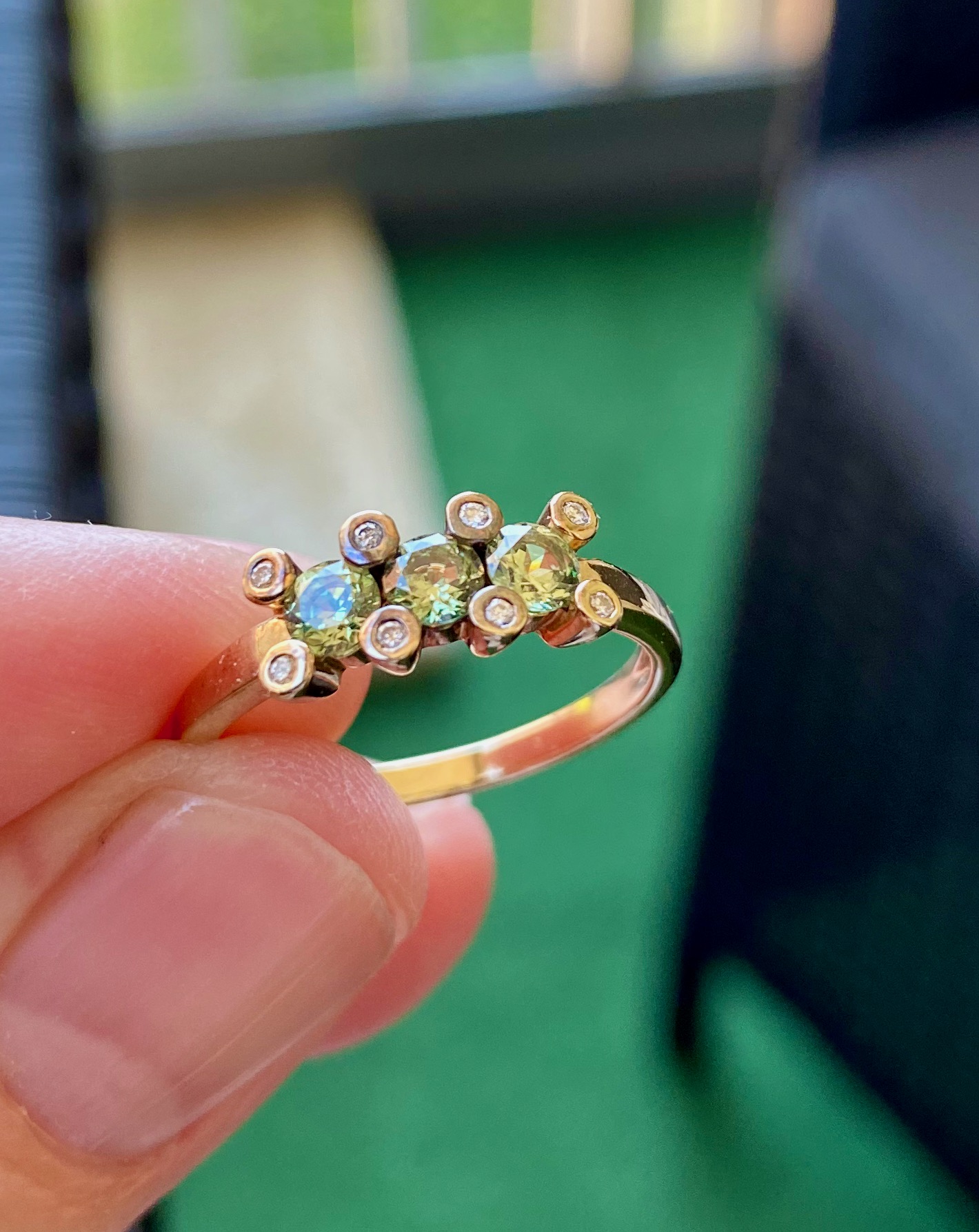 Sphene and diamond ring