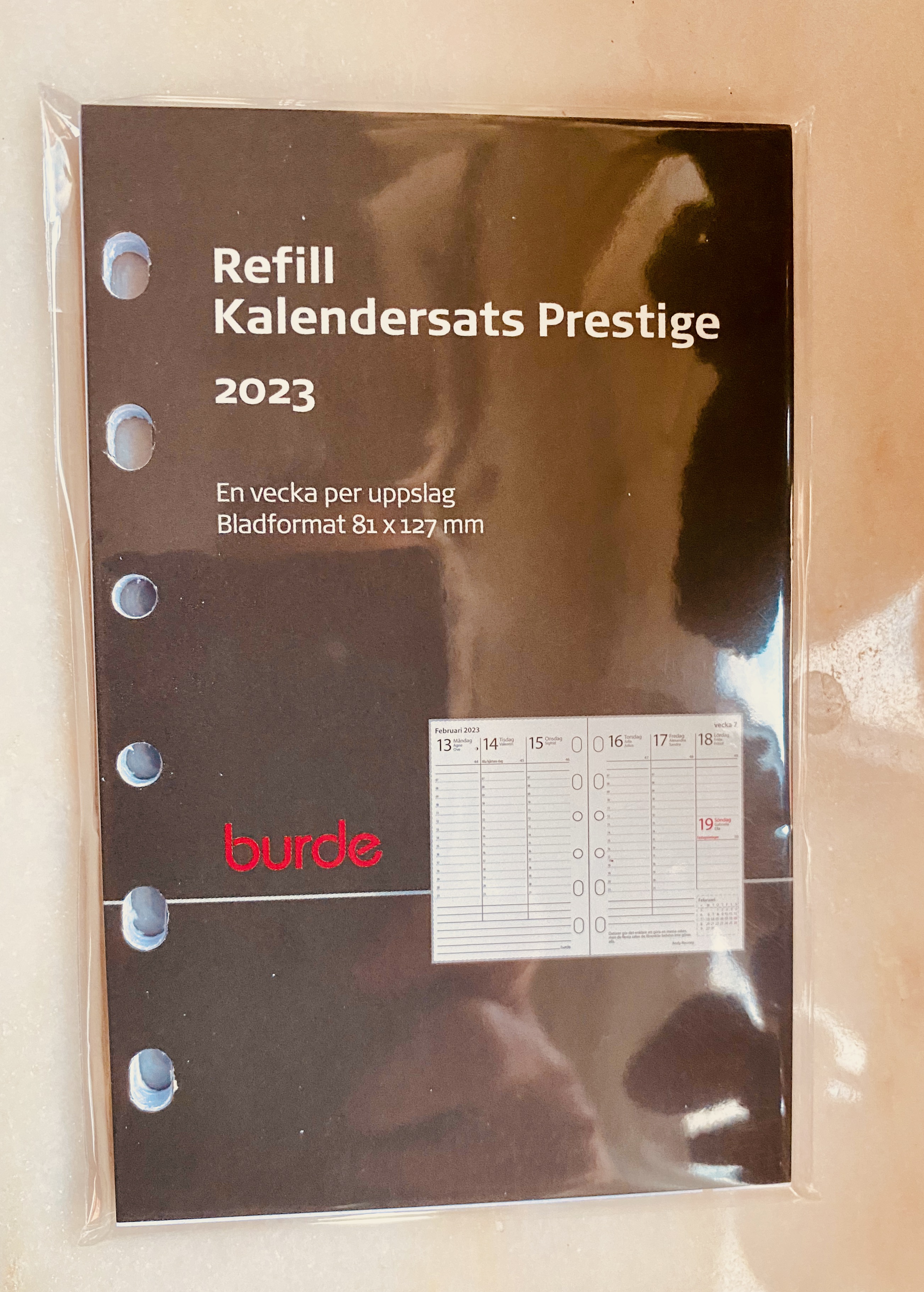 Green pocket-sized Filofax Tejus