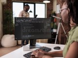 African American Software Developer Debugging Source Code Algorithm