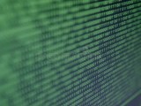 Bits And Bytes Screen With Binary Code Down Illuminated In Green