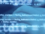 Typing Blue Source Code Of Computer Program On Dark Display