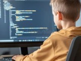 Young Kid Boy Programming Using Computer Learning Coding And Software