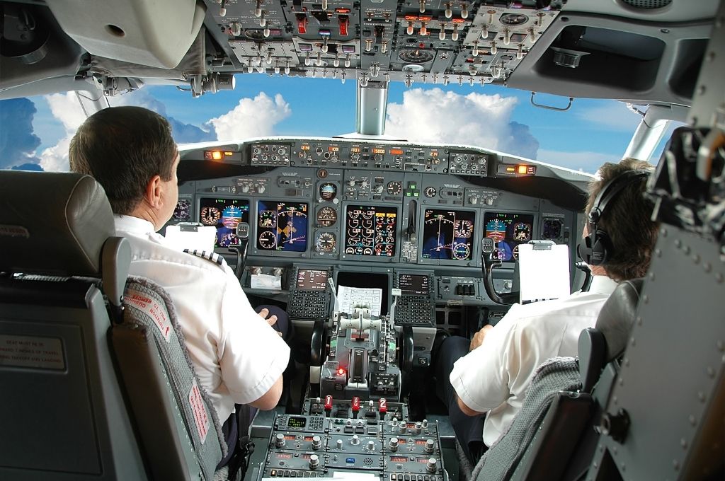 Do Airline Pilots Carry Guns in the Cockpit? [2022] - UponArriving