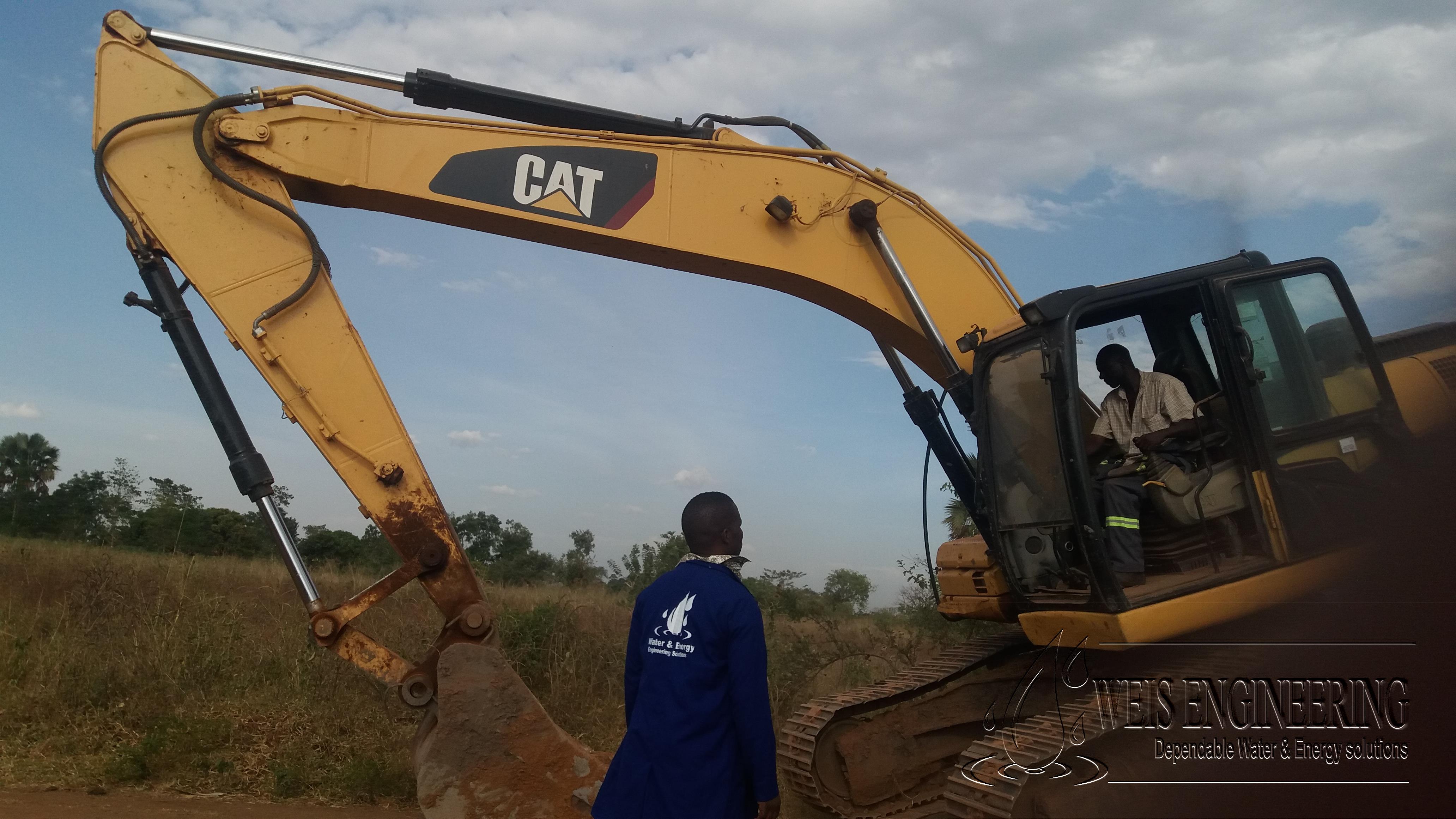 Valley tank excavation in Uganda - Weis Engineering Ltd