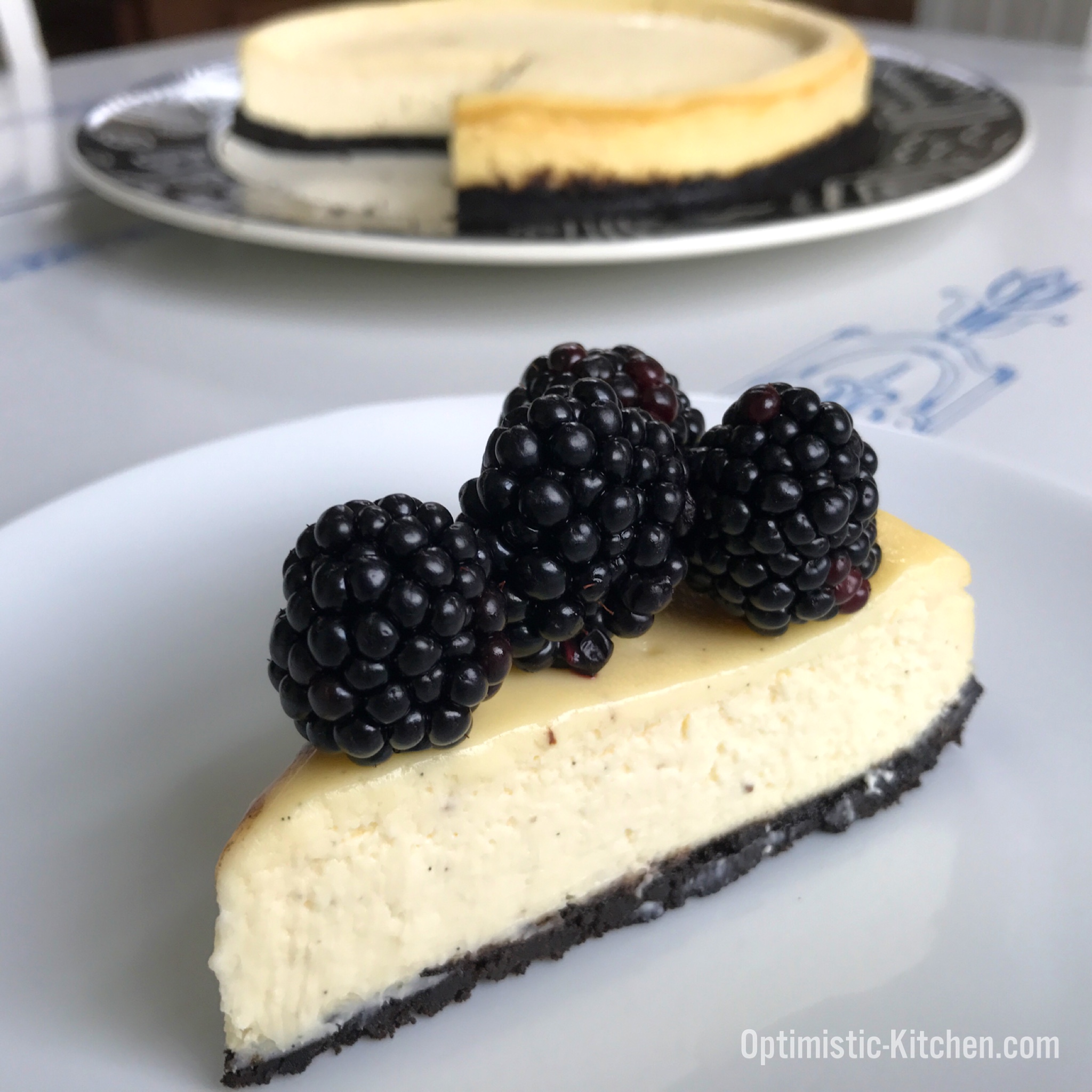Vanilla Bean Cheesecake with Oreo Cookie Crust - Optimistic Kitchen