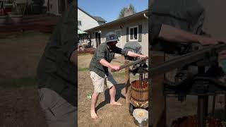 Pressing Apple Cider In An Apple Cider Press